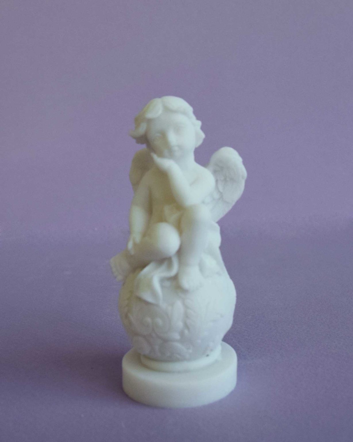 Angel sitting on a sphere statue type 1 made of Alabaster - eStatueShop