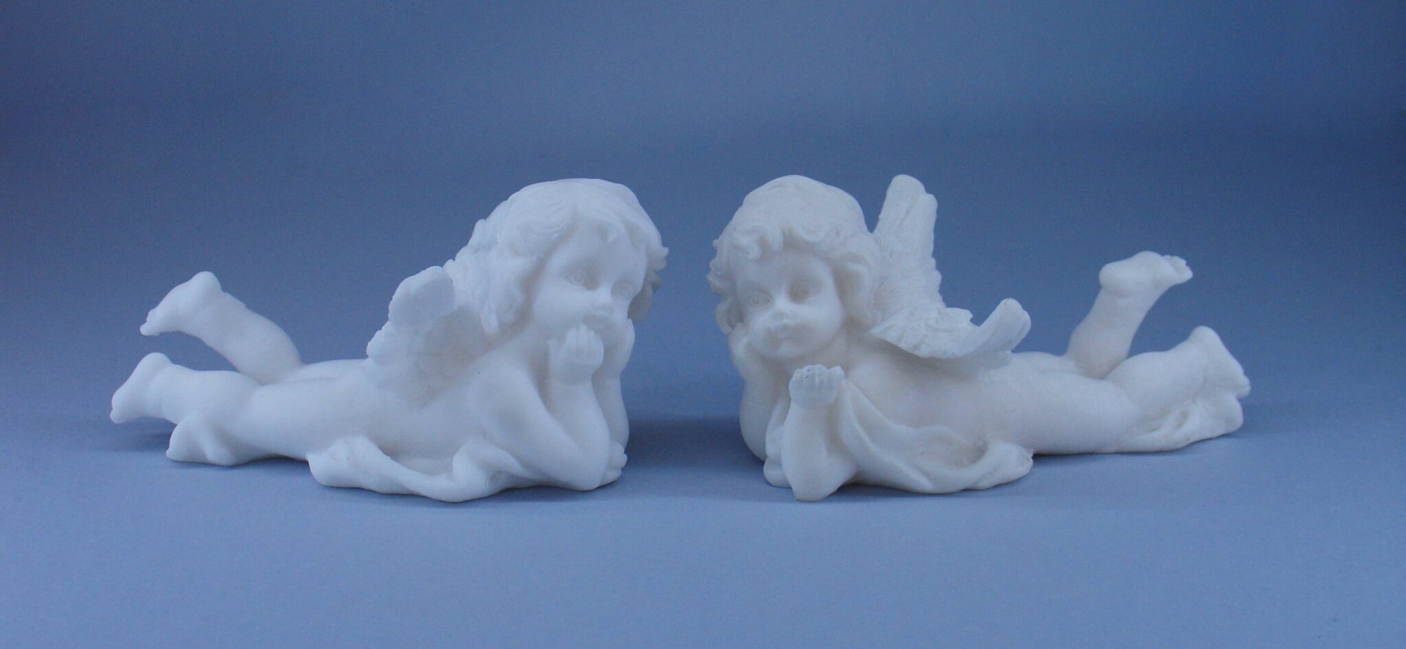 Angel lying face down holds its head statue - eStatueShop